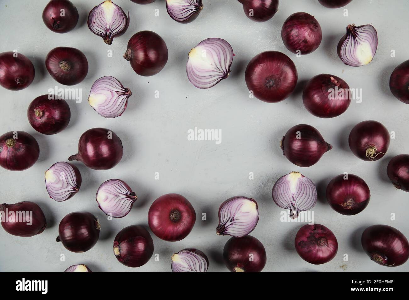sweet red onions on background Stock Photo - Alamy