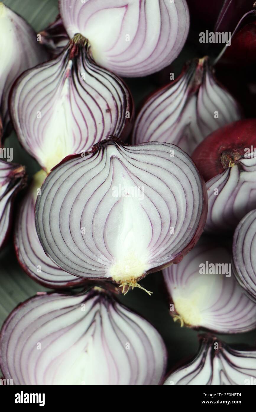 sweet red onions on background Stock Photo - Alamy