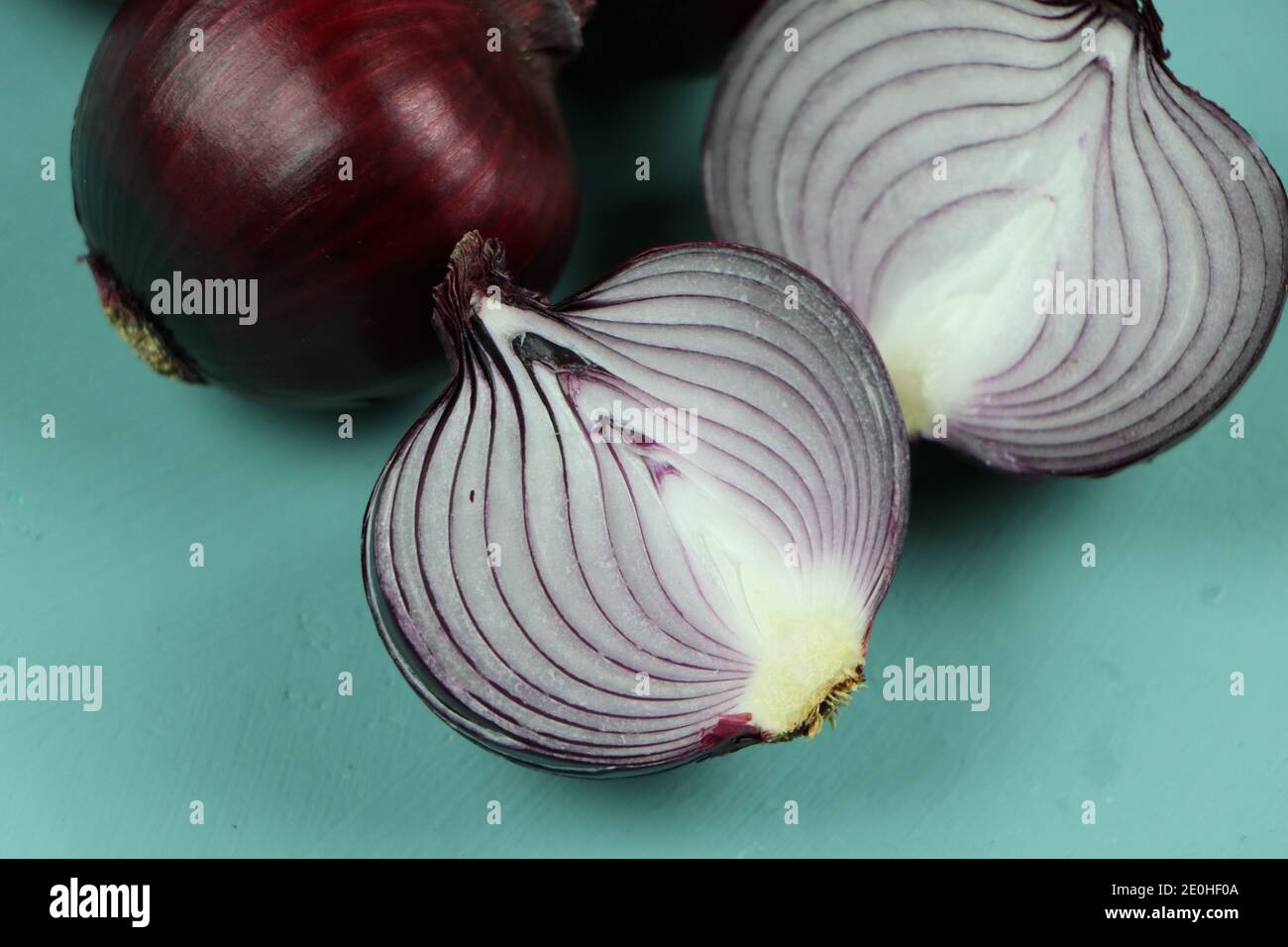 sweet red onions on background Stock Photo - Alamy