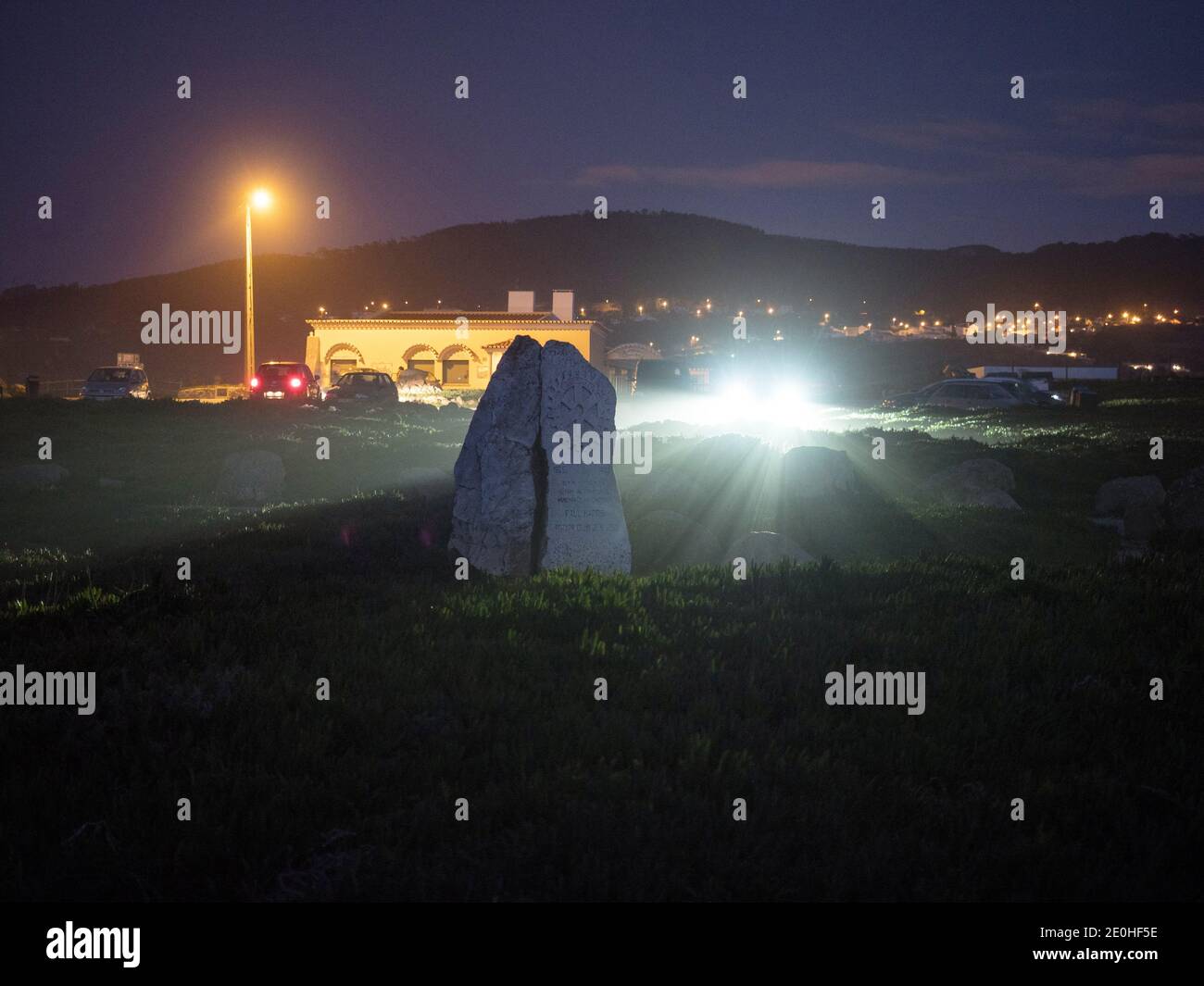 Paul Harris monument memorial rock stone in Cabo da Roca illuminated by ...