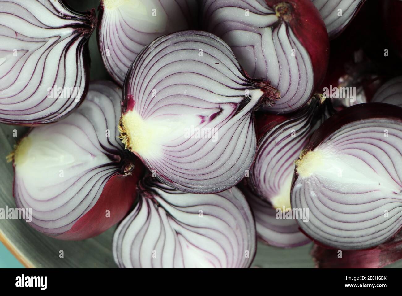 sweet red onions on background Stock Photo - Alamy