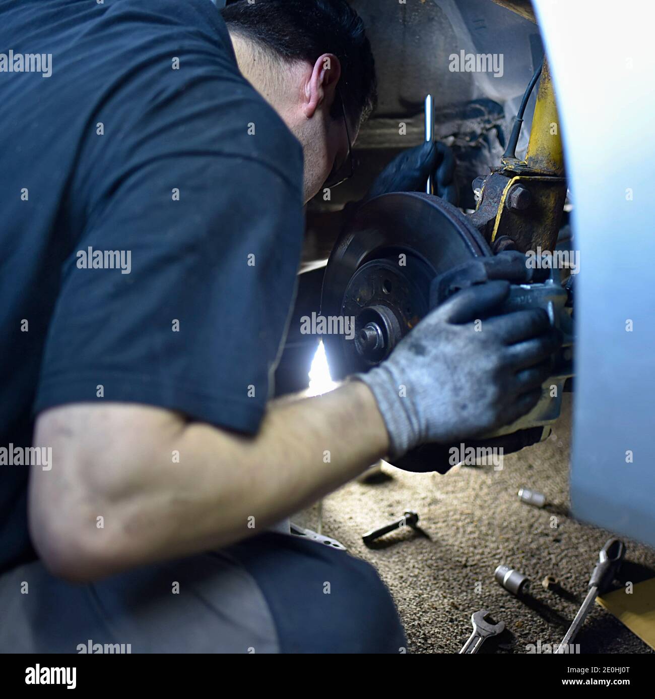 Car mechanic using torque wrench hi-res stock photography and images ...