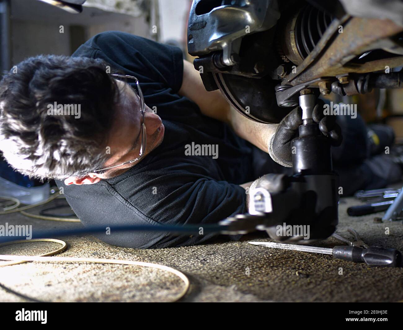 replacement car front axle lower ball joint using pneumatic torque ...