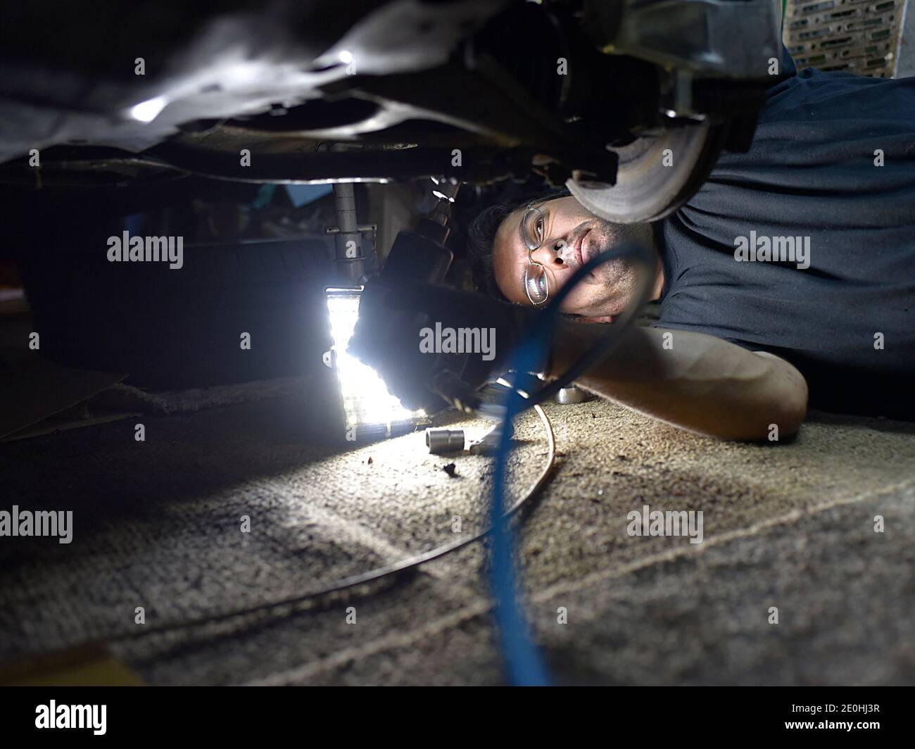 replacement car front axle lower ball joint using pneumatic torque ...