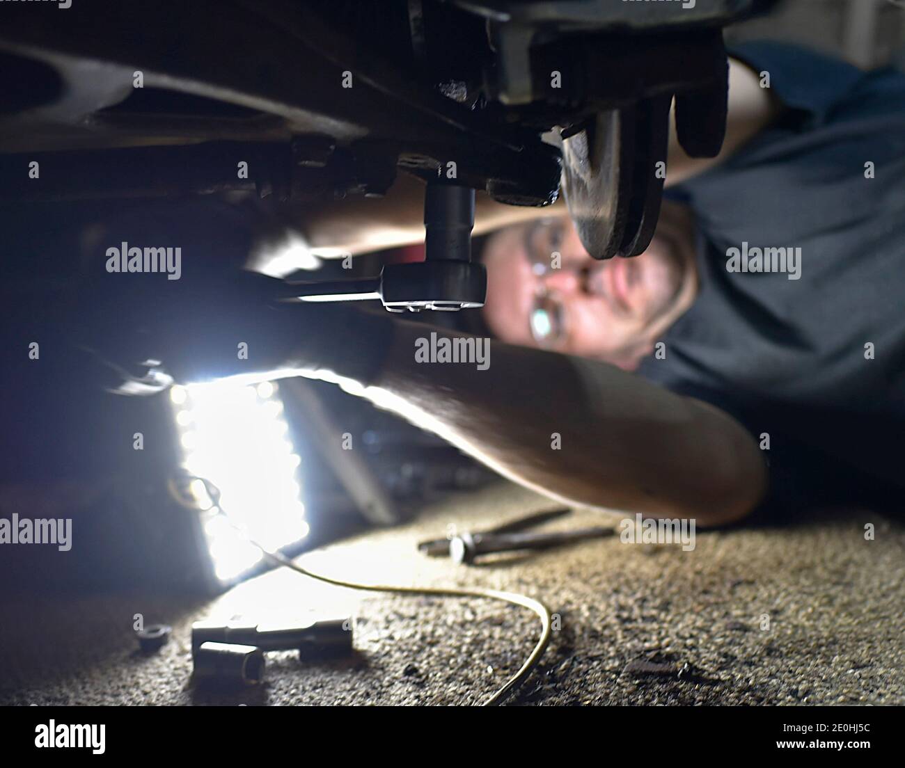 replacement car front axle lower ball joint using pneumatic torque ...