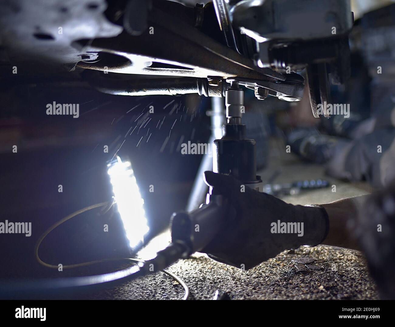 replacement car front axle lower ball joint using pneumatic torque ...