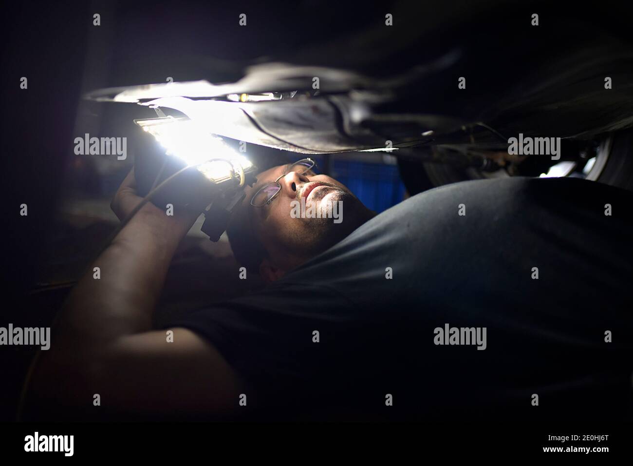 Car mechanic using torque wrench hi-res stock photography and images ...