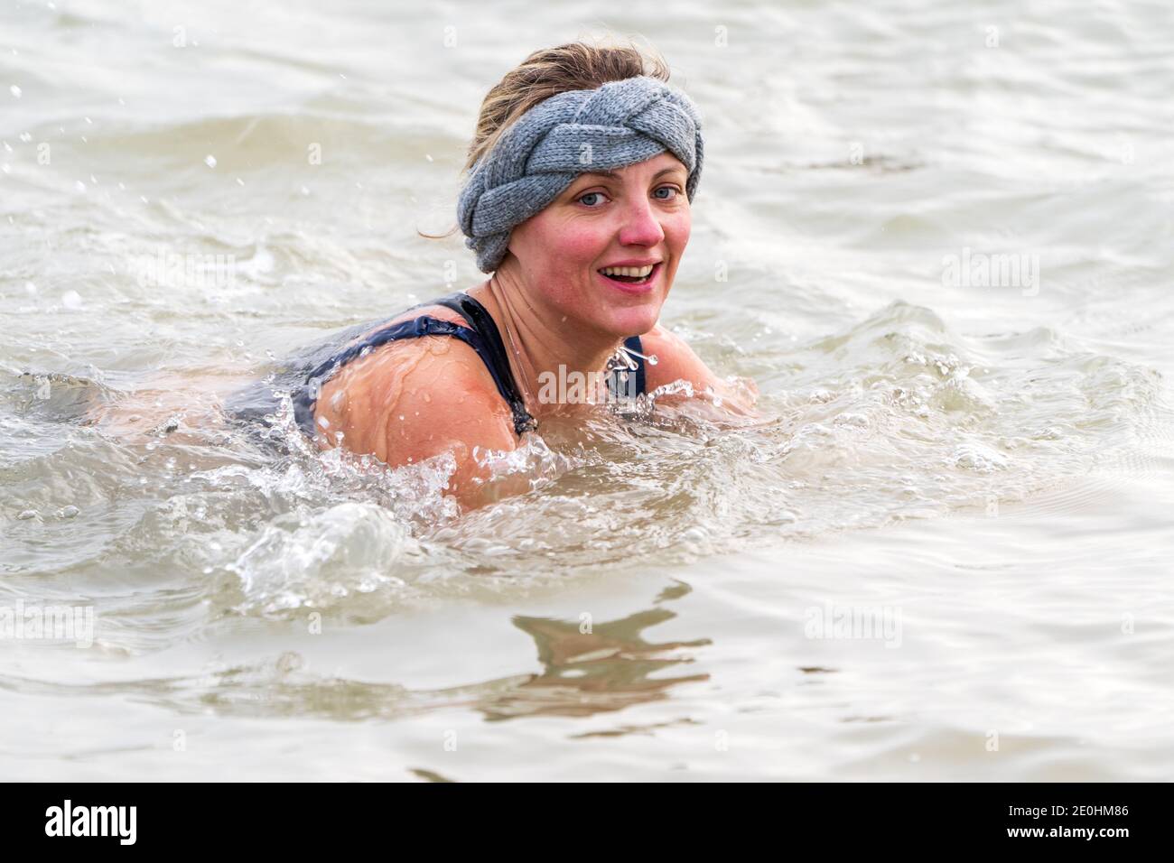Close up of middle aged woman swimming doing the breaststroke in the ...