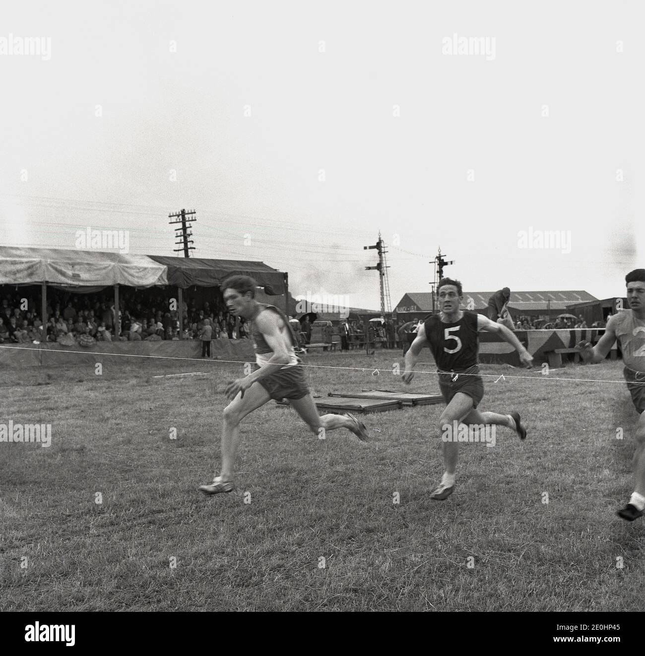 1960s, historical, running race at the Highand Games, Scotland, UK ...