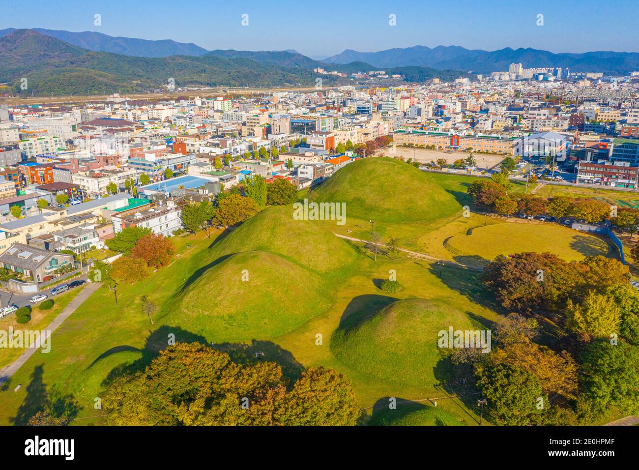 BUSAN, KOREA, OCTOBER 31, 2019: Aerial view of burial tombs in center ...