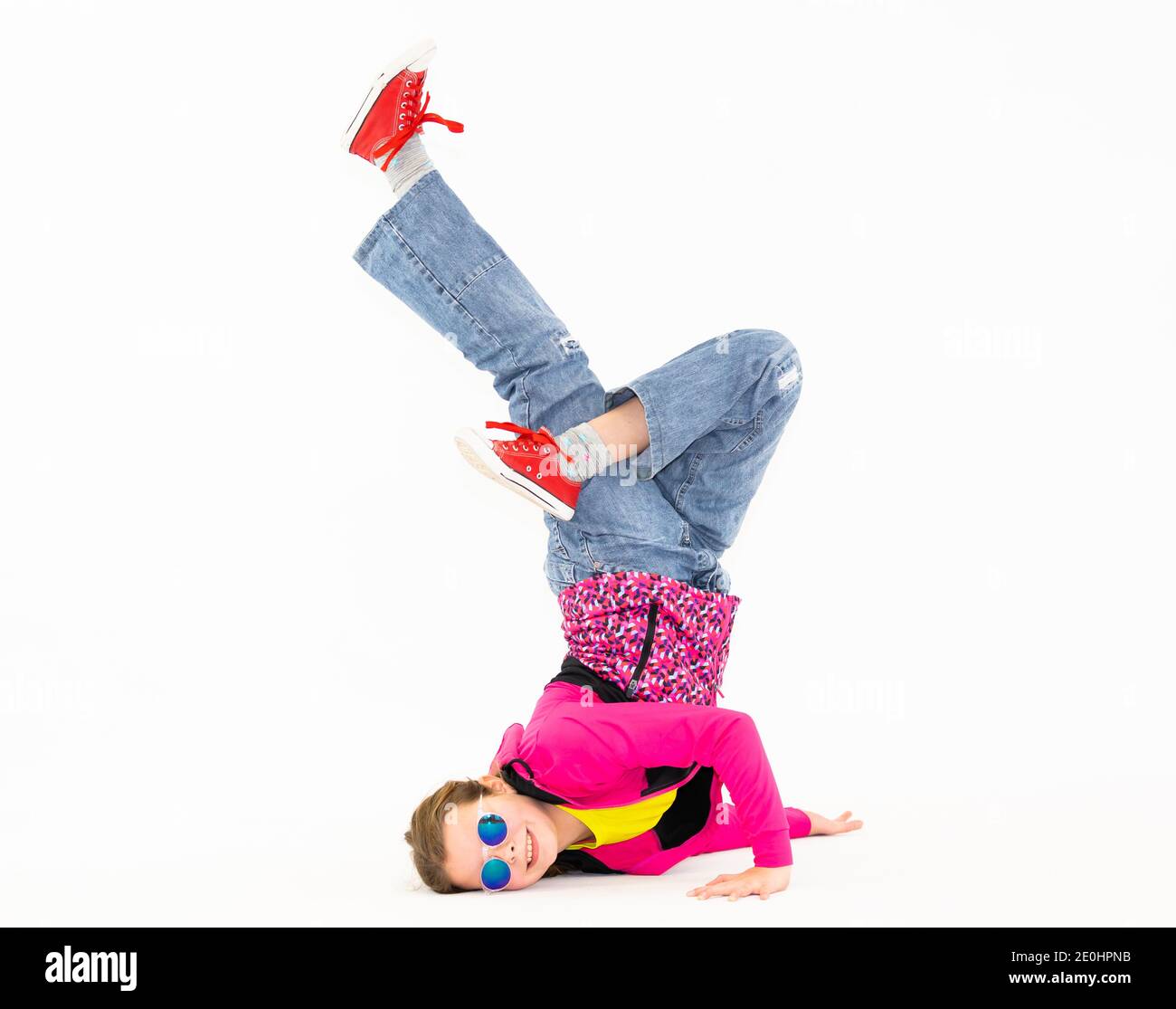 girl in a breakdance pose Stock Photo - Alamy