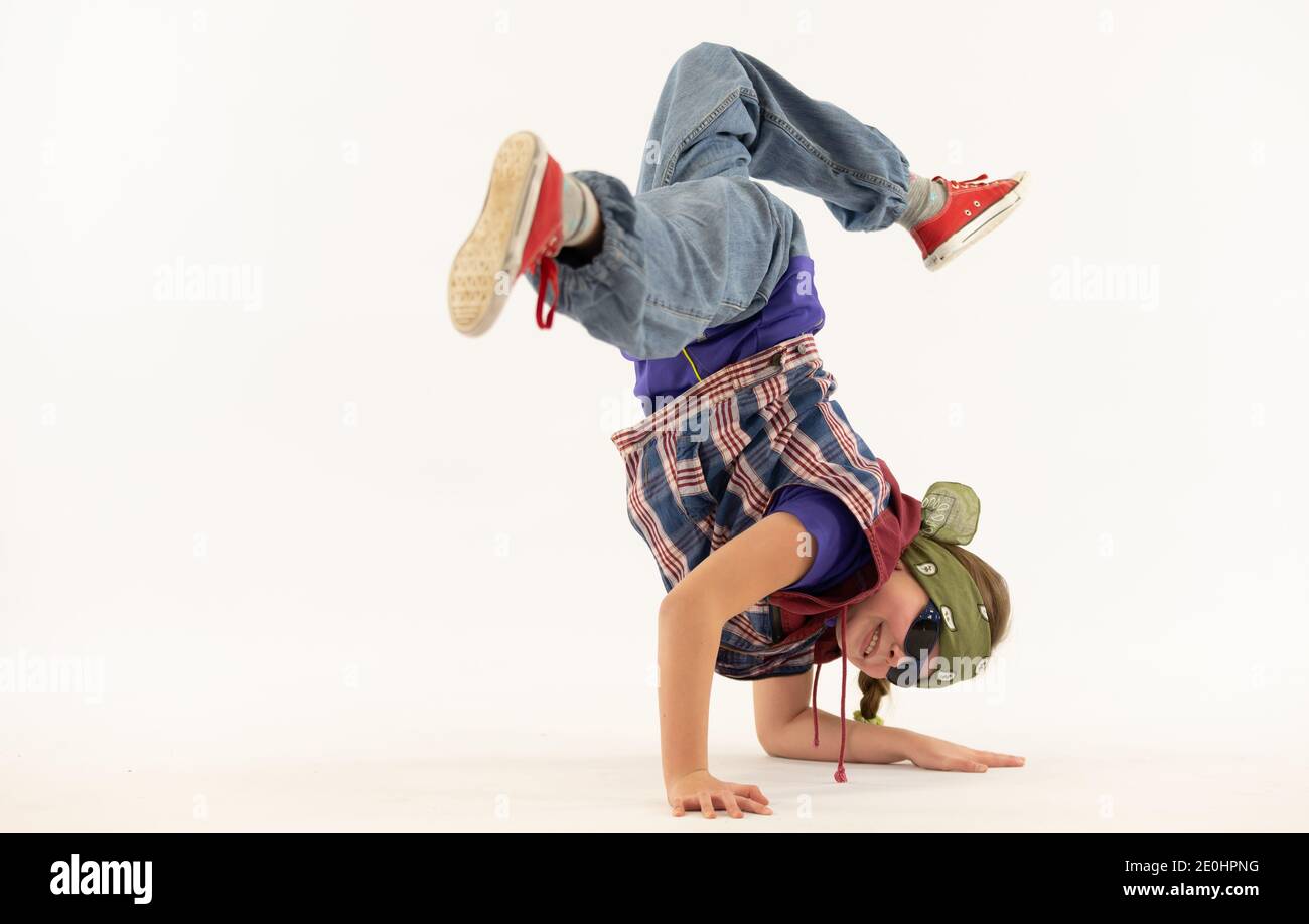 girl in a breakdance pose Stock Photo - Alamy