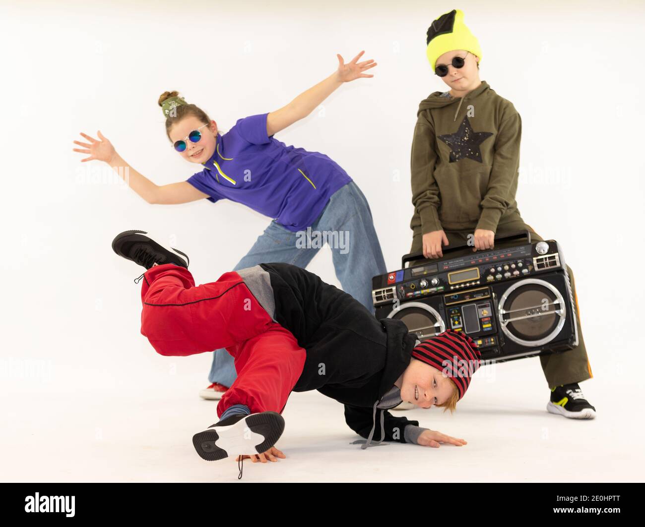 group of cheerful kids dancing breakdance, hip hop dance group with ...