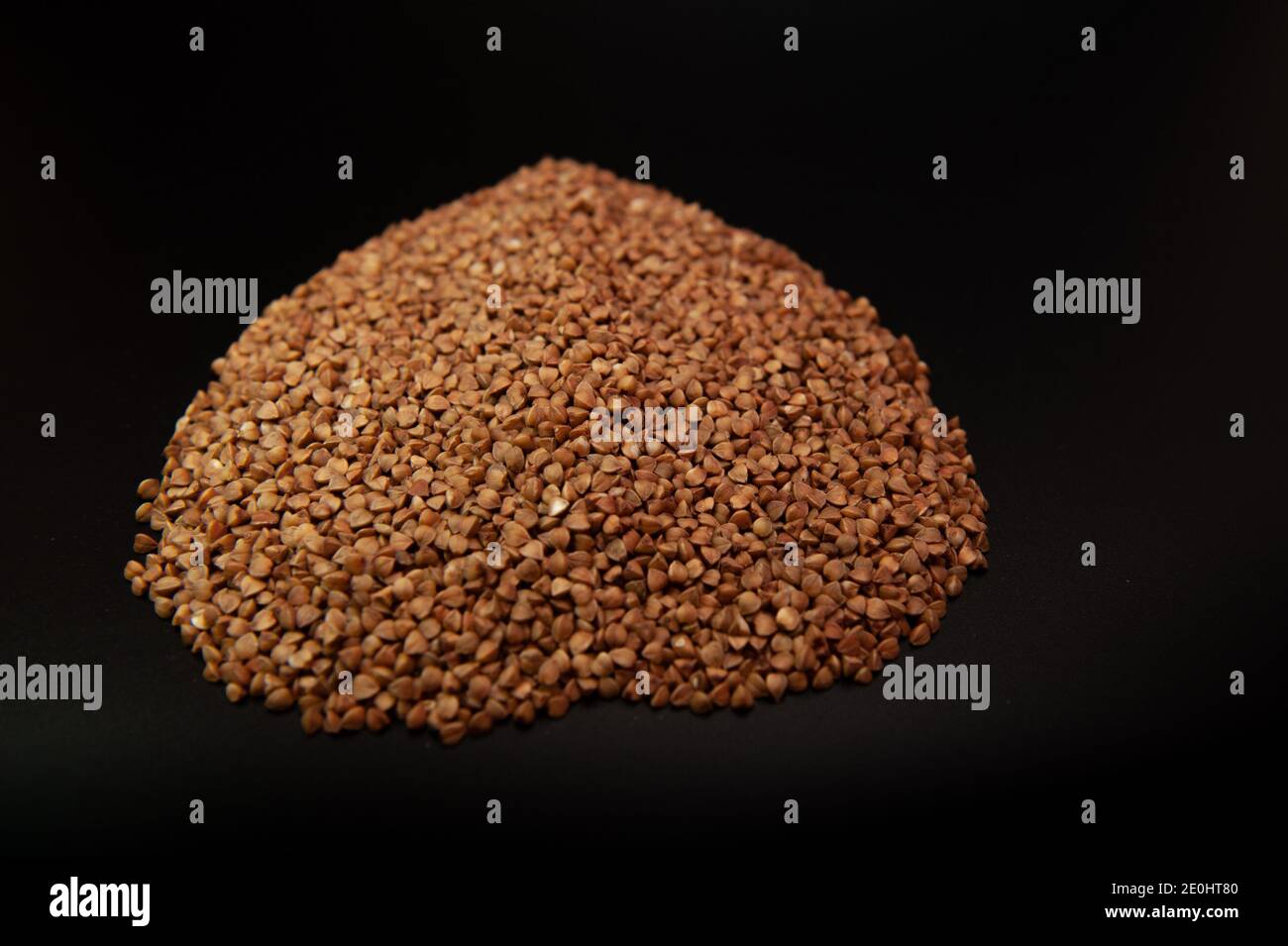 buckwheat on a black background view from above Stock Photo - Alamy