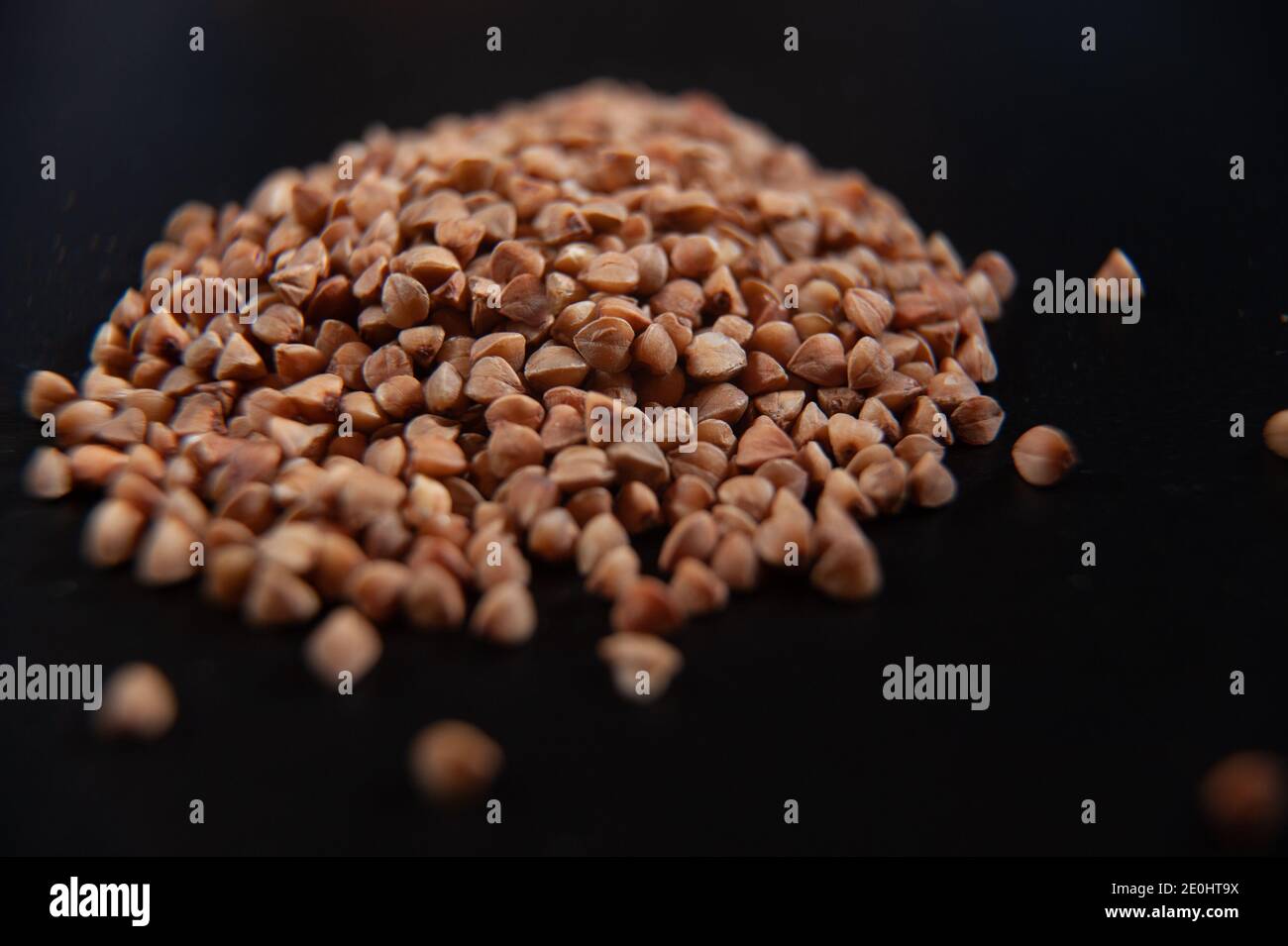 buckwheat close-up on a black background. at close range Stock Photo ...