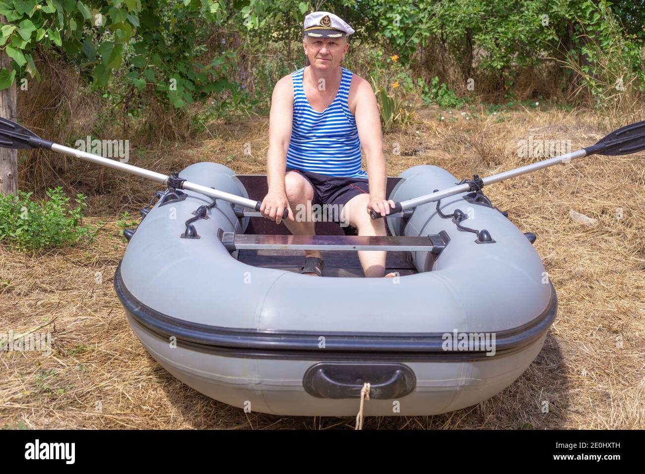 Inflatable boat grass hi-res stock photography and images - Alamy