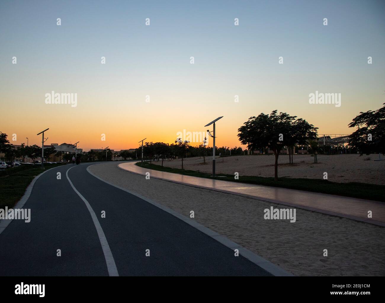 Jogging and cycling tracks in Al Warqa park, Dubai, UAE in the evening ...