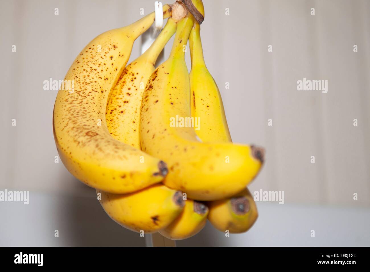 Bananas hanging kitchen hi-res stock photography and images - Alamy