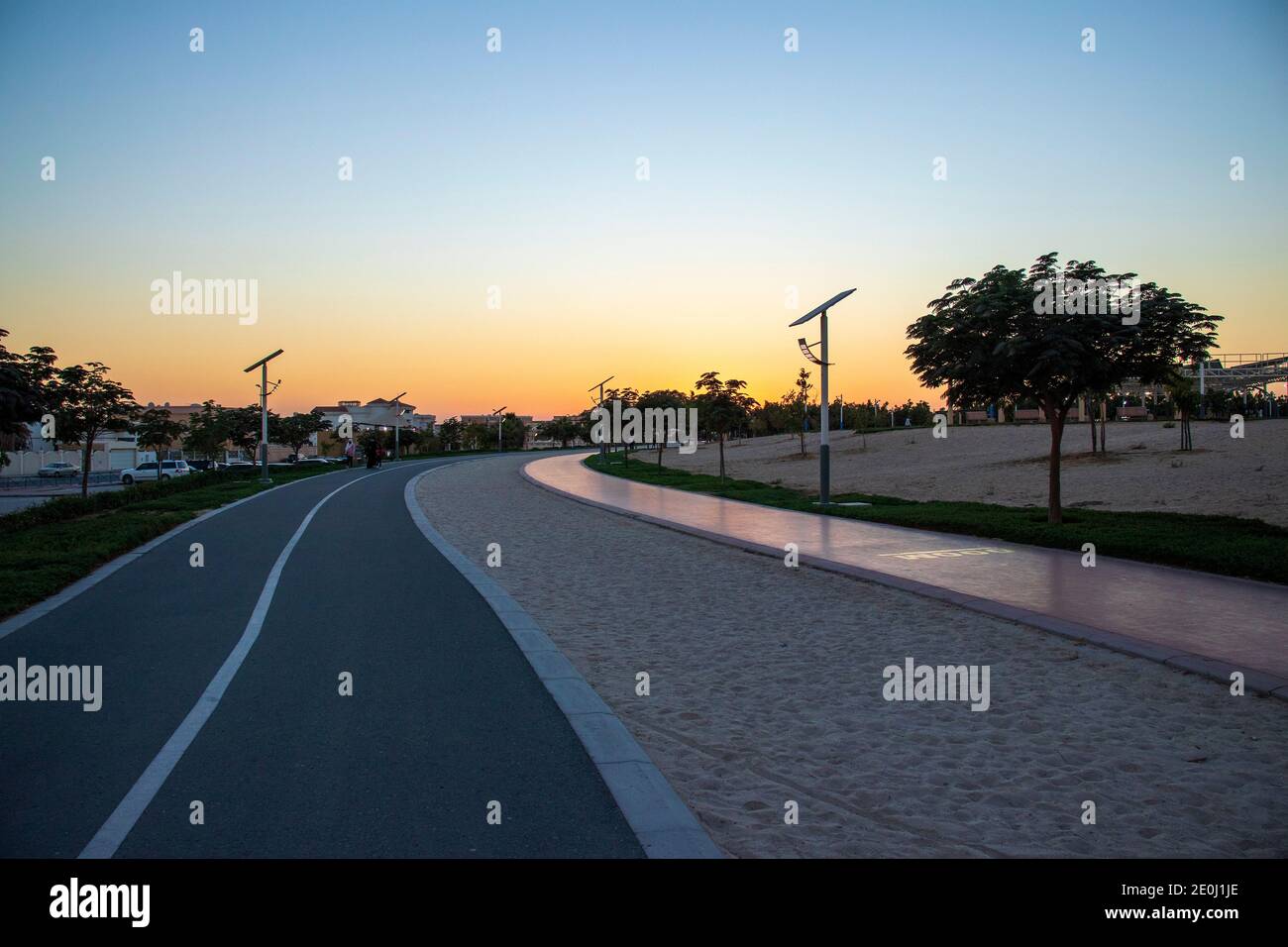 Jogging and cycling tracks in Al Warqa park, Dubai, UAE in the evening ...