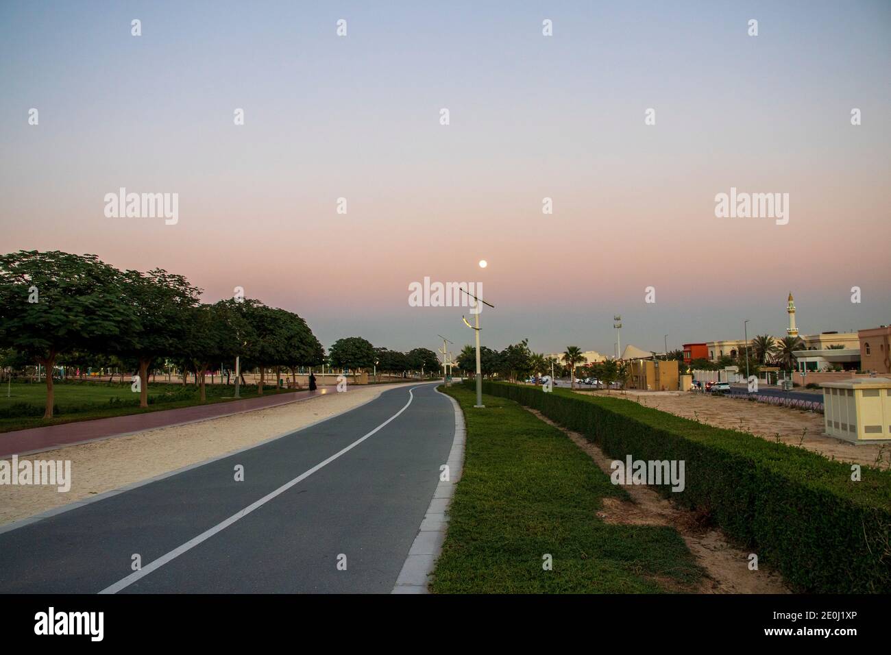 Jogging and cycling tracks in Al Warqa park, Dubai, UAE in the evening ...