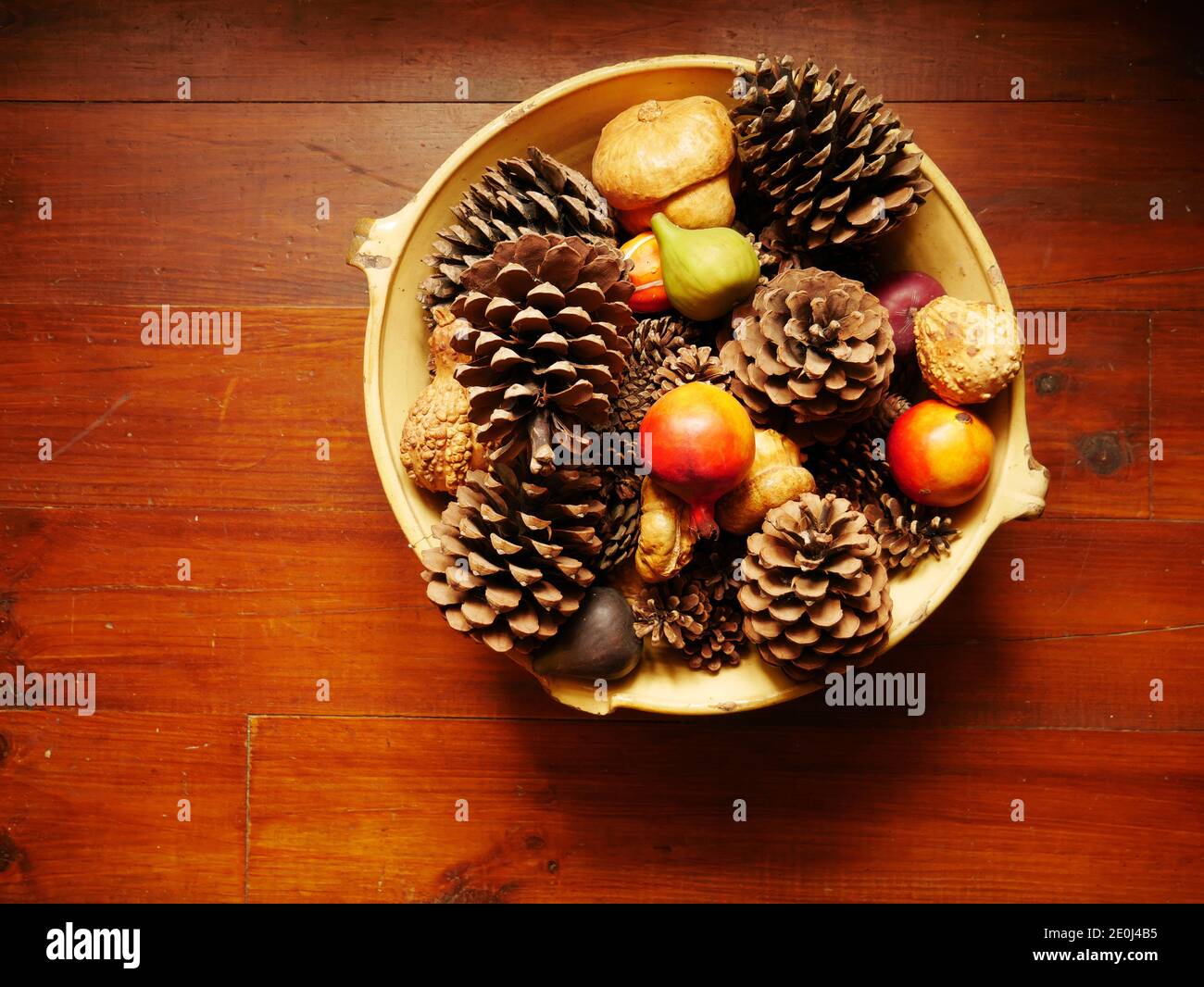 Rustic photo on a dish filled with food and items from the countryside ...