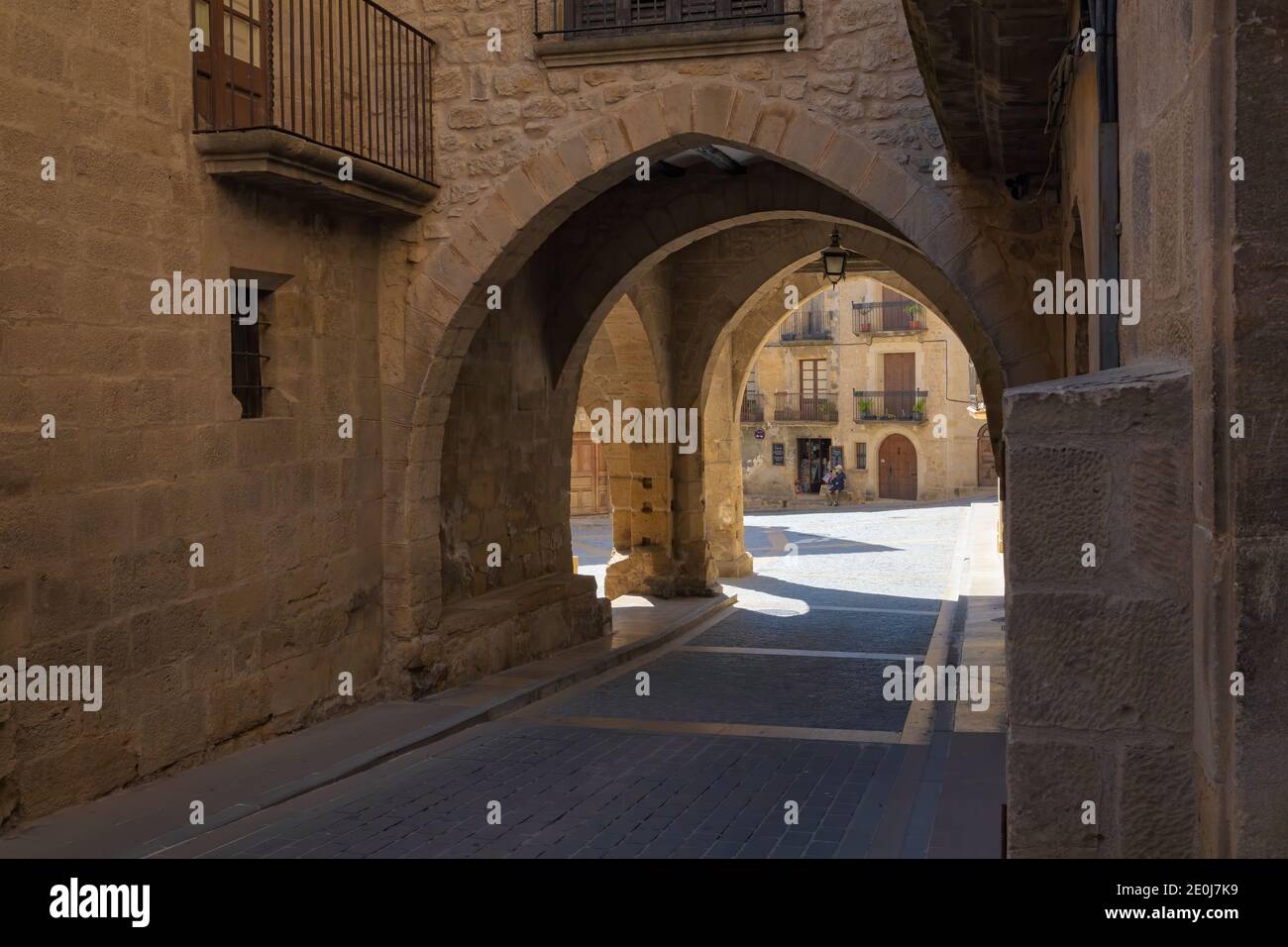 Entrance to the arcaded square of the historic center of Calaceite ...