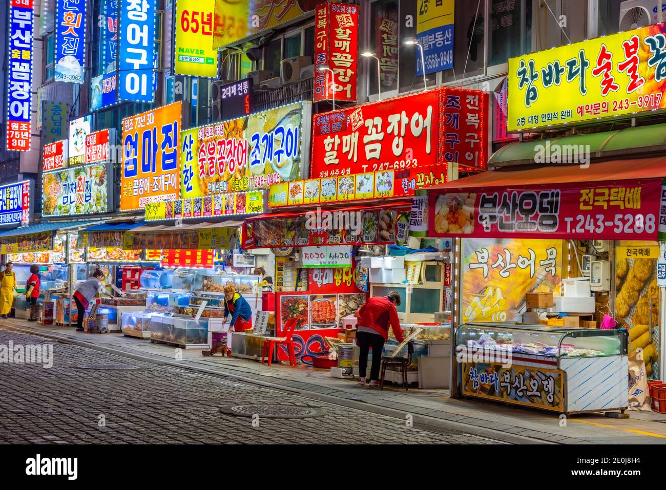 BUSAN, KOREA, OCTOBER 29, 2019: Night view of a narrow street in the ...