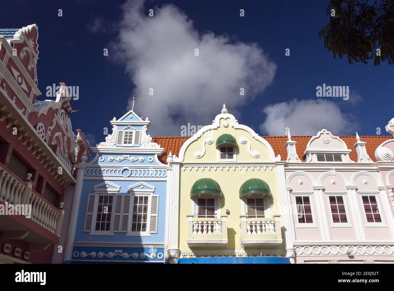 Historic and colorful Dutch colonial architecture are often used for ...