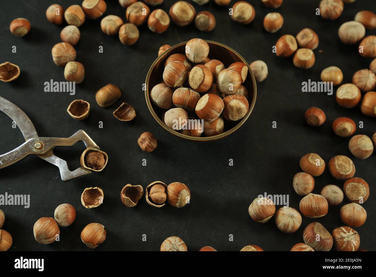 Hazelnuts on wooden backdrop. heap or stack of hazelnuts. healty food ...