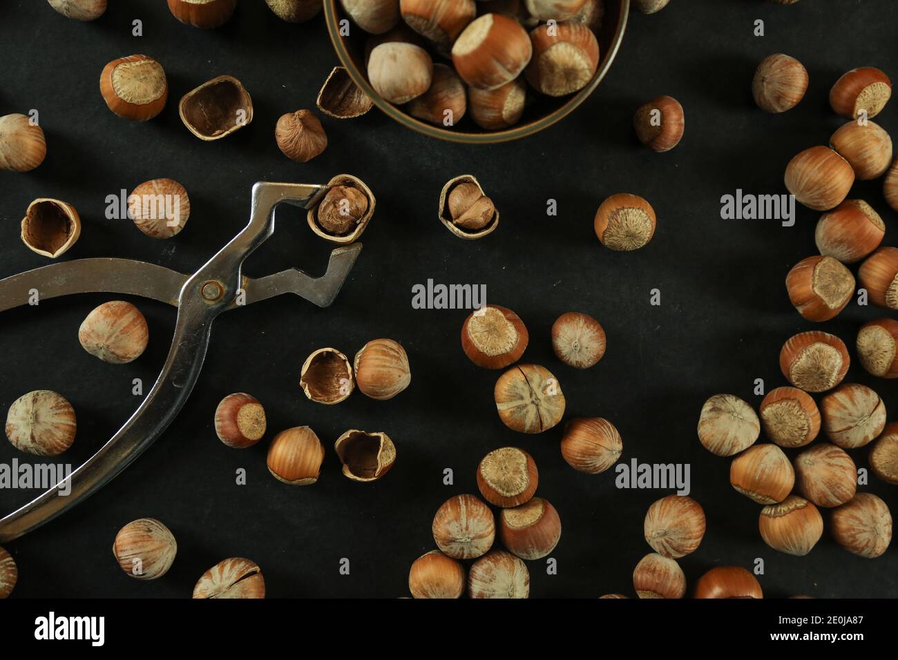 Hazelnuts on wooden backdrop. heap or stack of hazelnuts. healty food ...