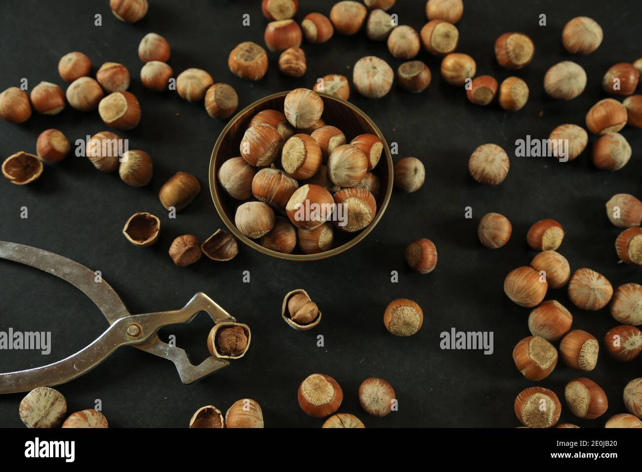 Hazelnuts on wooden backdrop. heap or stack of hazelnuts. healty food ...