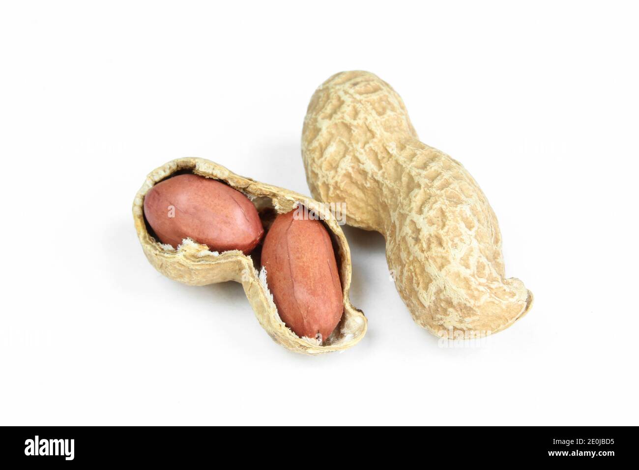 Peanuts in shell and peeled isolated on white background. Closeup and ...