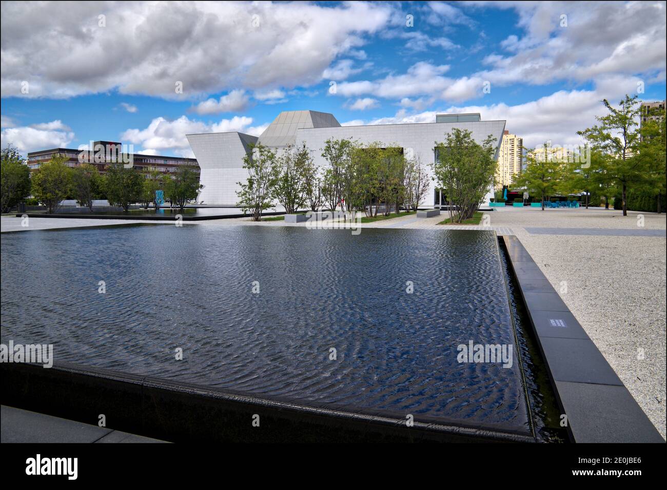 The exterior of the modern building with reflection in the water Stock ...