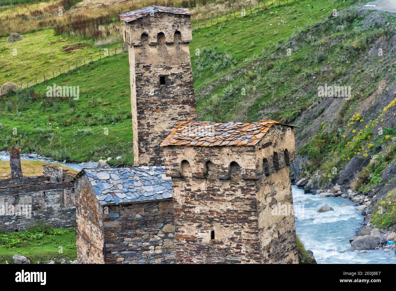 Svan houses with medieval watchtower in the Caucasus Mountain, Ushguli ...