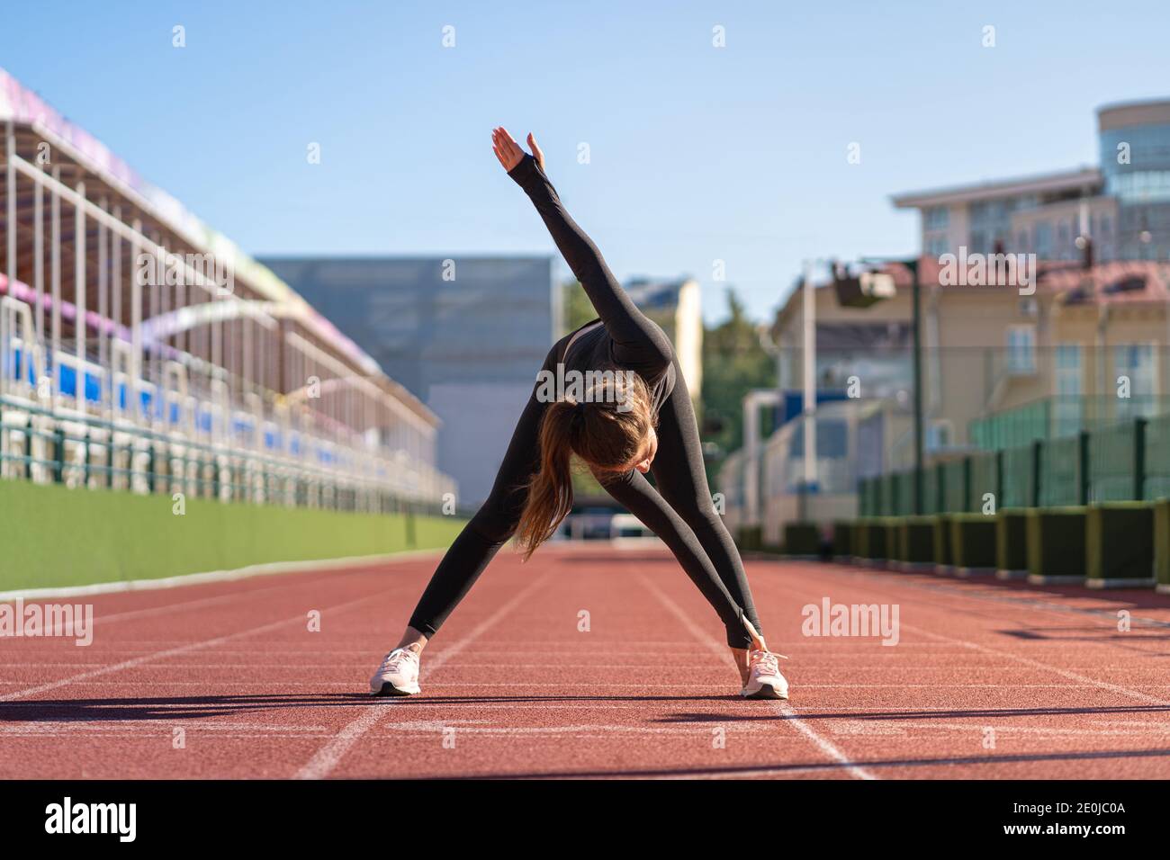Standing forward bend pose hi-res stock photography and images - Alamy