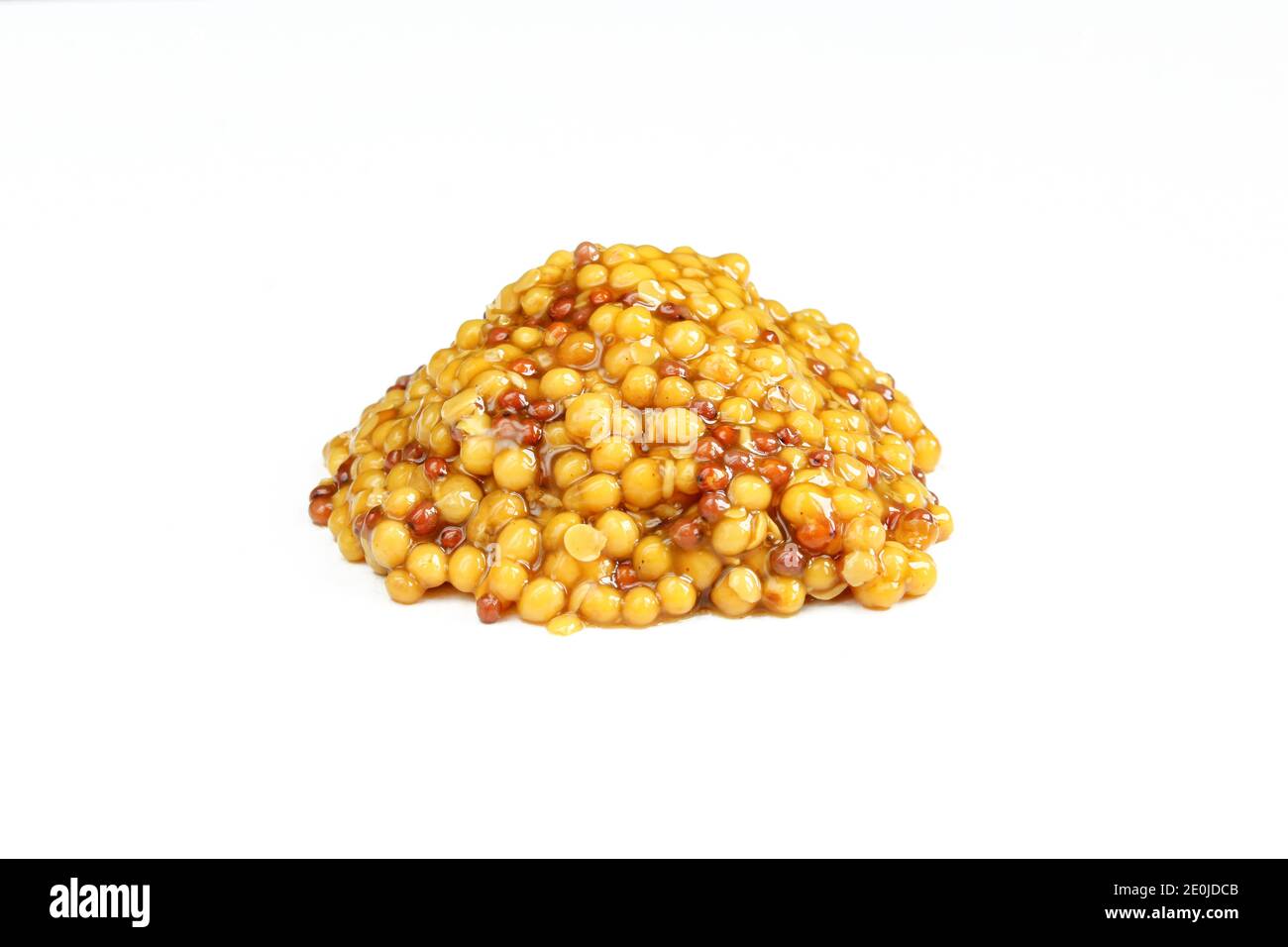 Pile of fresh french mustard seasoning isolated on white background ...