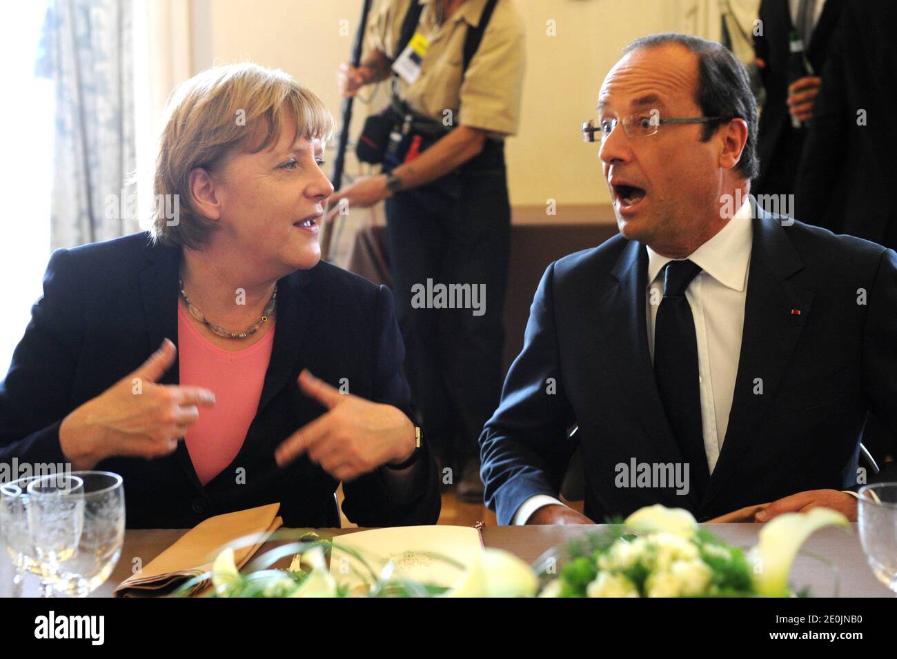 German Chancellor Angela Merkel and French President Francois Hollande ...