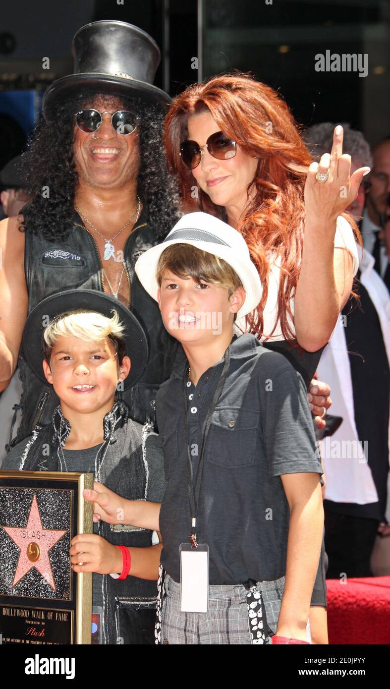 Slash (Saul Hudson) Perla Ferrar, their children, Slash (Saul Hudson ...