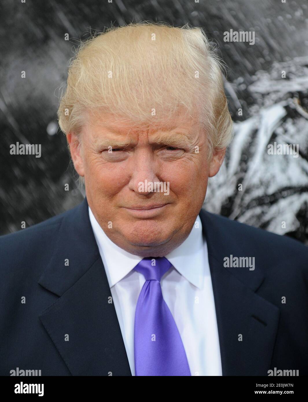 Donald Trump attending 'The Dark Knight Rises' premiere held at the AMC ...