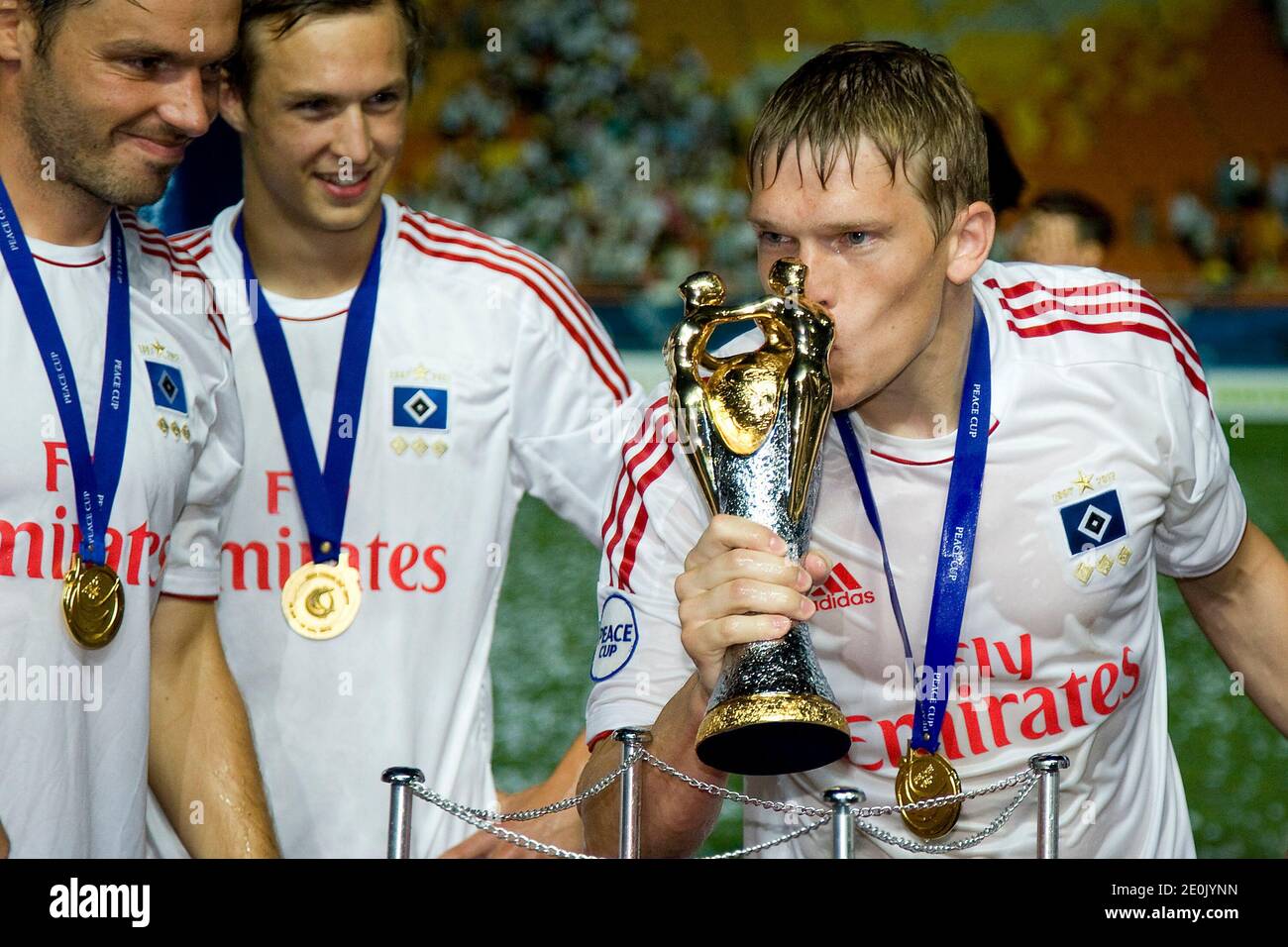 Artjoms Rudnevs of Hamburger celebrates with the Peace Cup trophy after ...