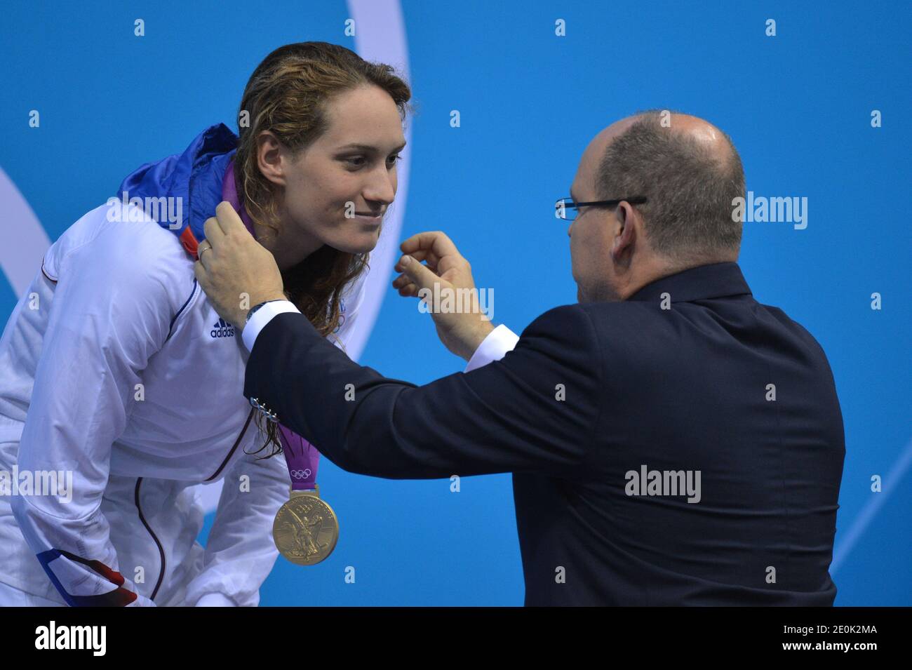 France's Camille Muffat receiving the gold medal by Prince Albert II of ...
