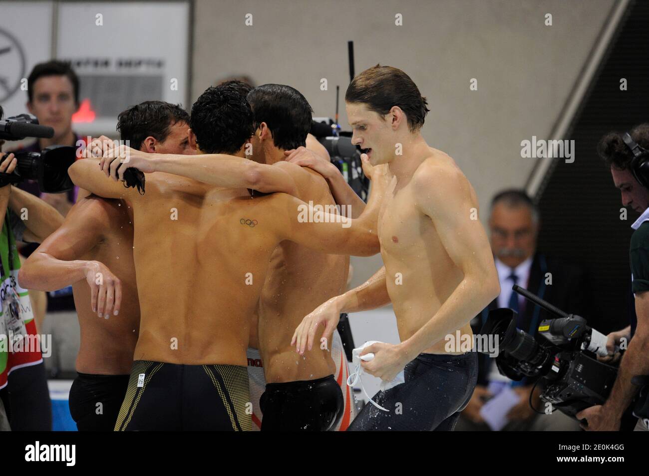 France's Yannick Agnel congratulates USA's Michael Phelps after he wins ...