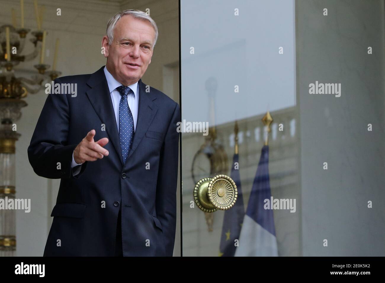 French Prime Minister, Jean-Marc Ayrault leaves the Elysee Palace in ...