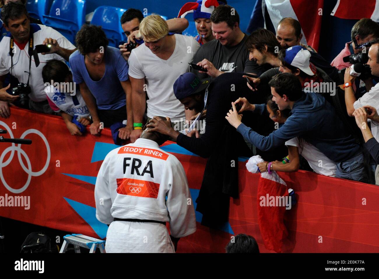 France's Teddy Riner celebrates with Fans and Family after winning the ...