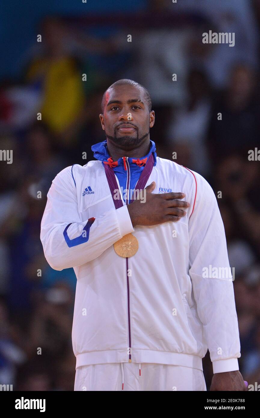 France's Teddy Riner celebrates with his Gold Medal after winning the ...