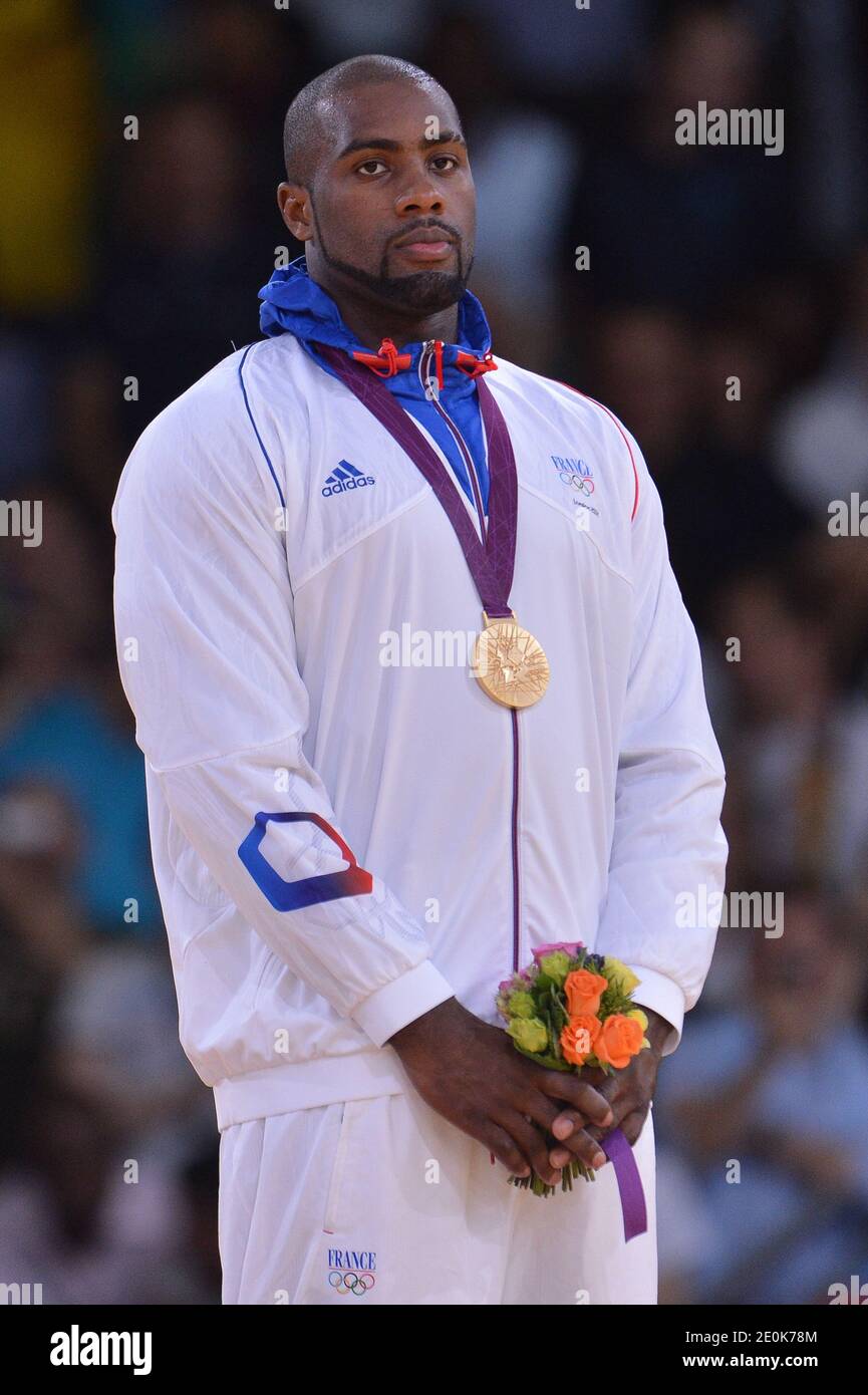 France's Teddy Riner celebrates with his Gold Medal after winning the ...