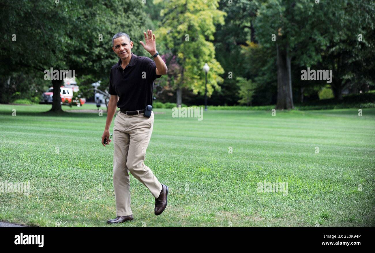 US President Barack Obama arrives on the South Lawn of the White House ...