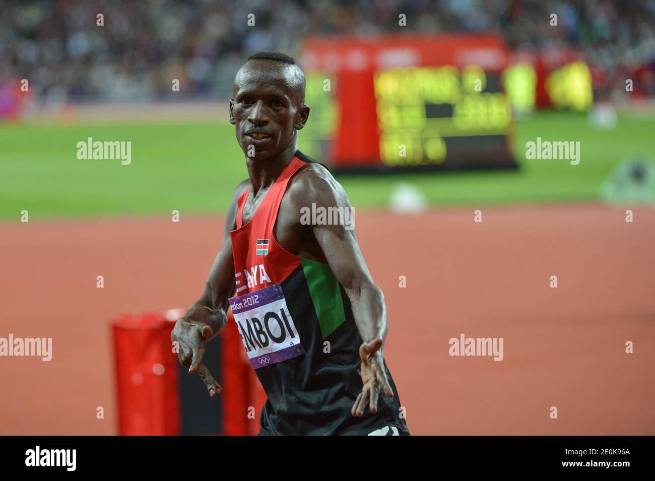 Kenya's Ezekiel Kemboi celebrates his victory after the men's 3000m ...