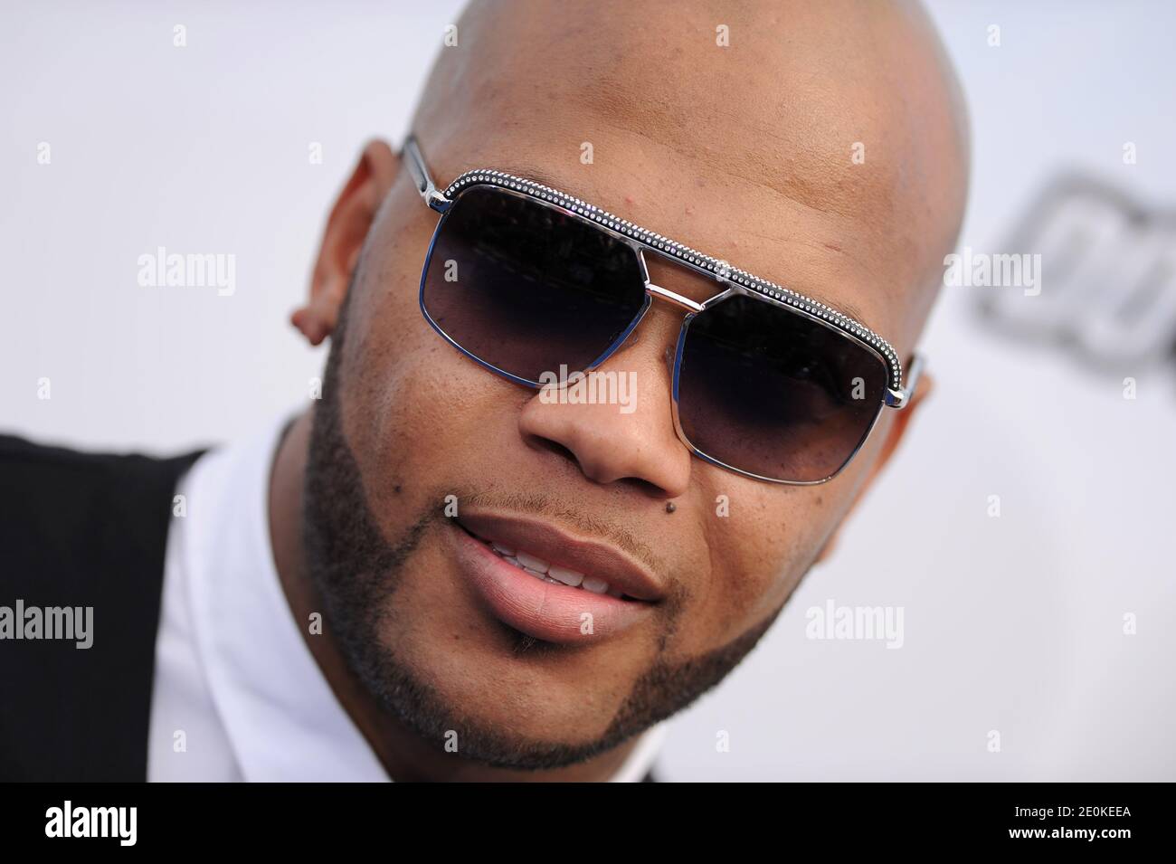 Flo Rida arrives at the 2012 Do Something Awards at Barker Hangar in ...