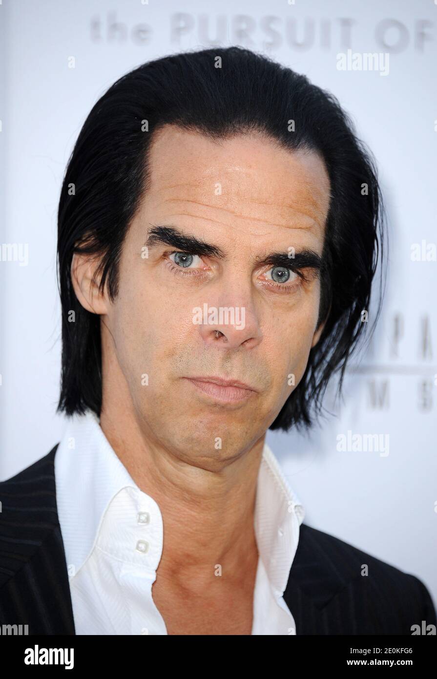 Nick Cave arrives for the premiere of the Weinstein Company's 'Lawless ...